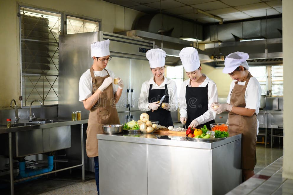 Culinary Students Learning Together during a Hands on Cooking Class in ...