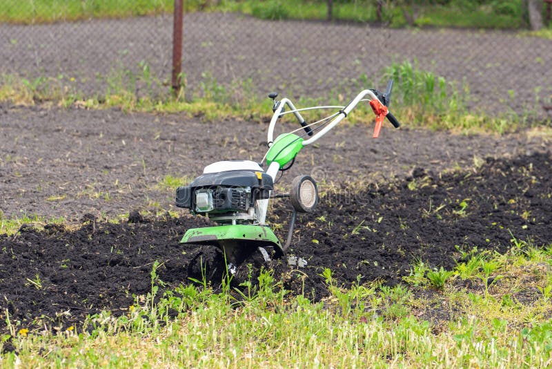 Cultivator for Cultivating the Soil in the Garden Editorial Stock Photo ...