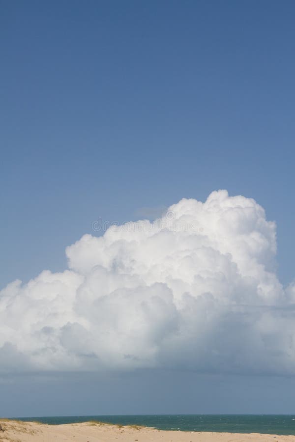 Cumulus Cloud with Ocean and Beach Stock Photo - Image of cloudy ...