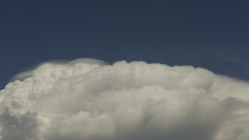 Cumulus Clouds Building Up with Cirrus Clouds Above Them and a Blue Sky ...