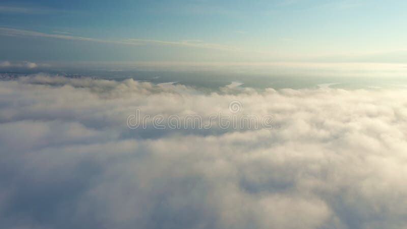 Cumulus Clouds Fill the Sky with a Dense Layer. Footage Shows a Game of ...