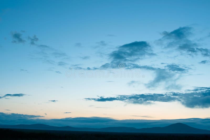 Cumulus Clouds of the Sunset with the Sunset Blue Sky Blurred ...