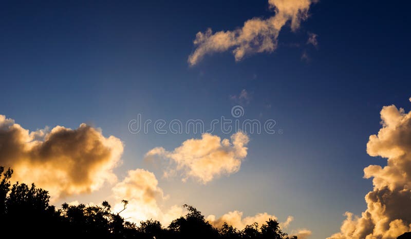 Cumulus and Stratus Clouds in Dramatic Sunset Sky Stock Photo - Image ...