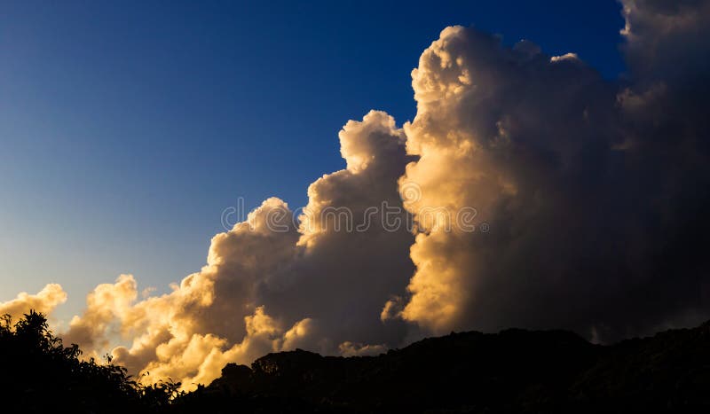 Cumulus and Stratus Clouds in Dramatic Sunset Sky Stock Image - Image ...
