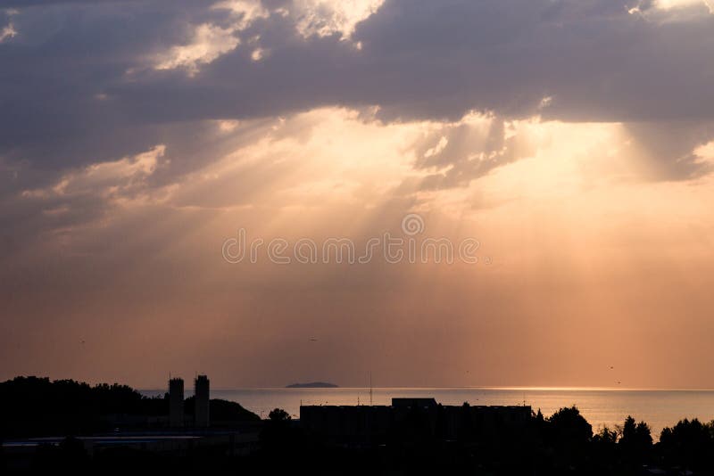 Cumulus Sunset Clouds with Sun Setting Down Light with Sea Stock Photo ...