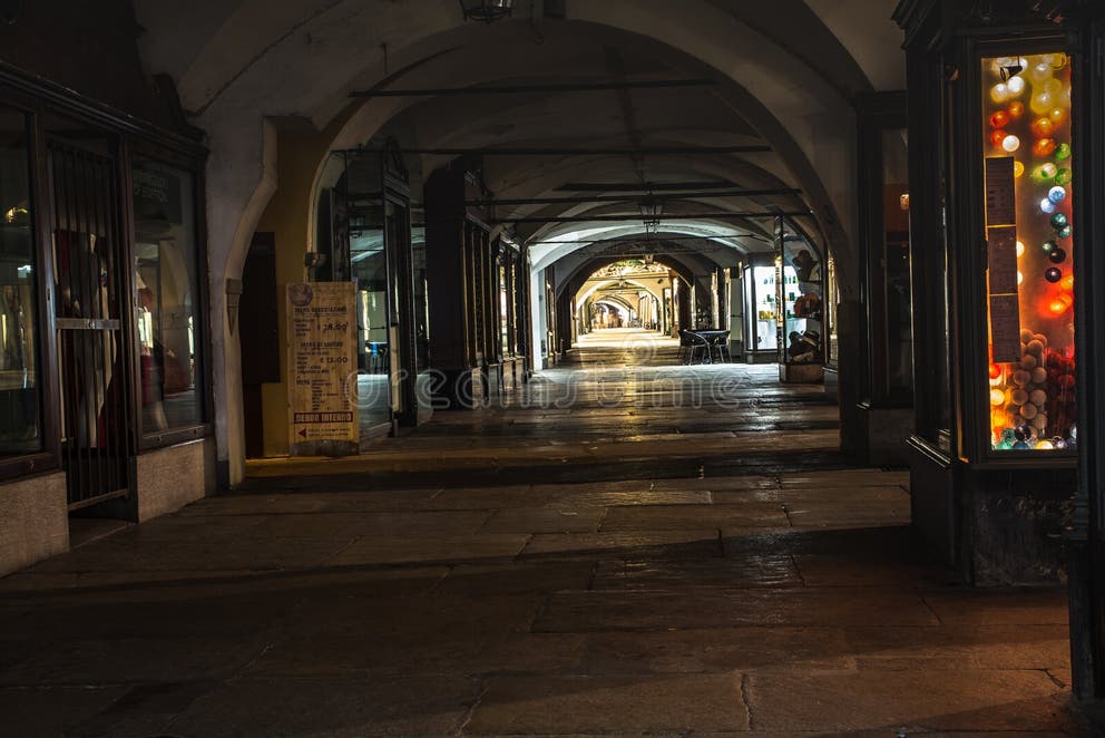 Cuneo under the arches editorial image. Image of bike - 76049610