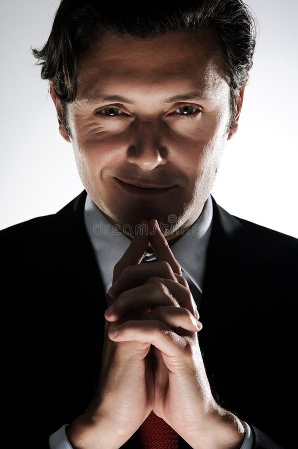 Devious businessman stock photo. Image of shaven, dramatic - 22749652