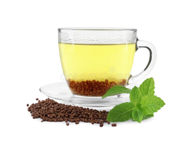Cup of Aromatic Buckwheat Tea, Granules and Mint on White Background ...