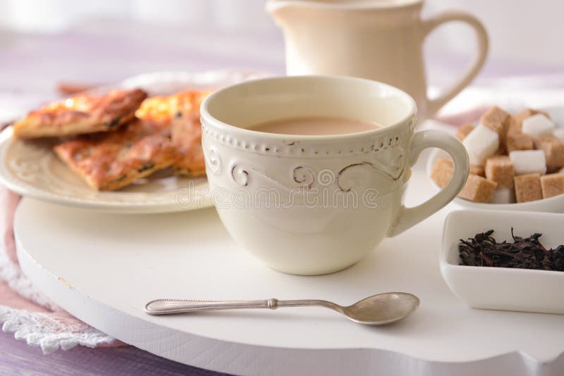 Cup of Aromatic Tea with Milk on Table, Top View Stock Photo - Image of ...