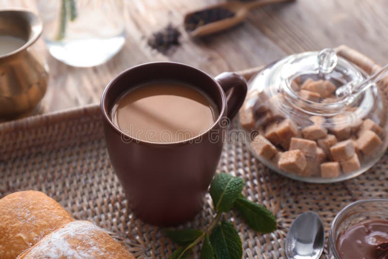 Cup of Aromatic Tea with Milk on Wicker Tray Stock Image - Image of ...