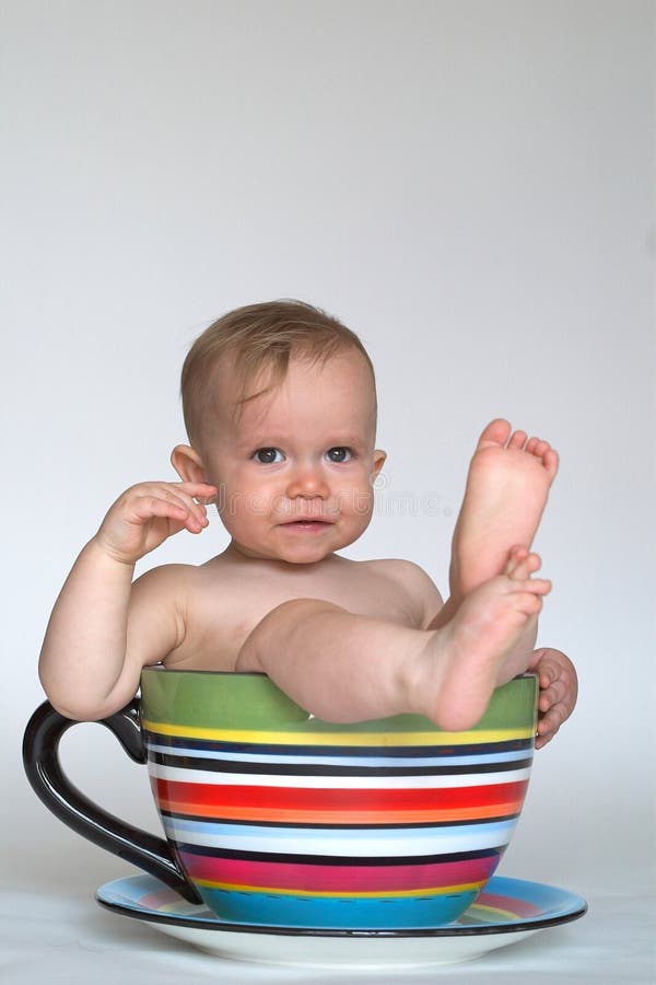 Baby in a tea cup stock image. Image of happy, beauty - 18612539
