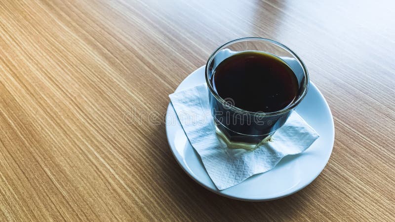 A Cup of Black Coffee on the Dining Table in a Cafe Stock Photo - Image ...