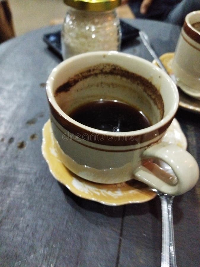 A Cup of Black Coffee that is almost Gone Stock Image - Image of saucer ...
