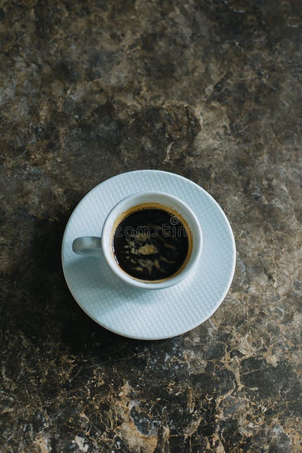 Cup of Black Coffee on a Marble Table in a Cafe Stock Photo - Image of ...
