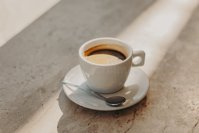 Cup of Black Coffee on a Marble Table in a Sunlight. Natural Warm ...
