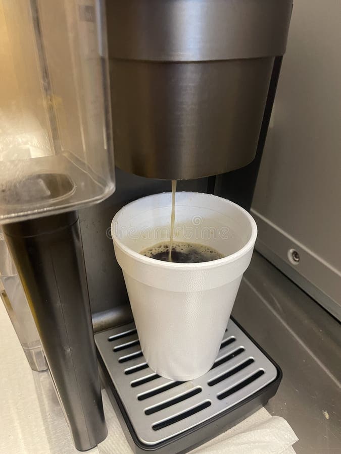 Black Coffee in a Styrofoam Cup Coffeemaker Streaming Stock Image ...