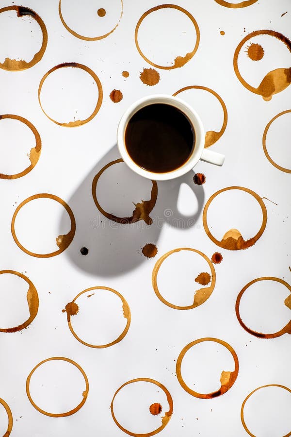 Cup of Black Coffee on a Surface with Many Coffee Stains Stock Photo ...