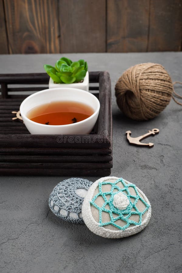 Cup of Black Tea and Crocheted Pebbles Stock Photo - Image of herbal ...