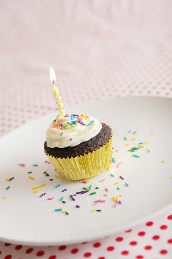 Cup cake with candle stock image. Image of bake, food - 12451913