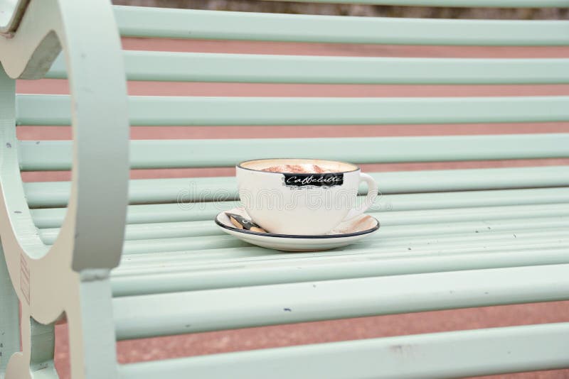 Cup of cappuccino stock image. Image of bench, furniture - 60944787