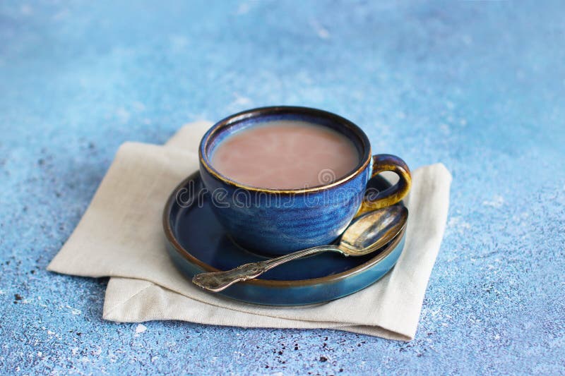 Cup of Cappuccino for Breakfast. Blue Cup with Latte on Blue Saucer on ...
