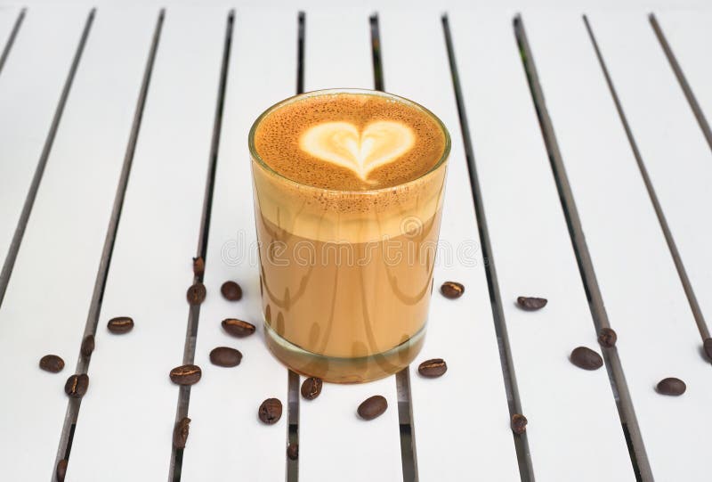 Cup of Cappuccino in Glass on Wooden White Table Side View Stock Image ...