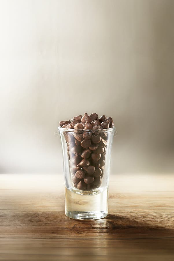 Cup of Chocolate Chips stock photo. Image of chocolate - 33571738