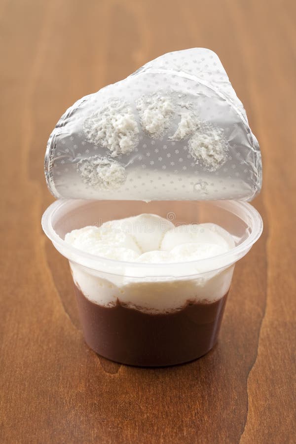 Cup of chocolate pudding stock image. Image of cream, lidding - 7719169