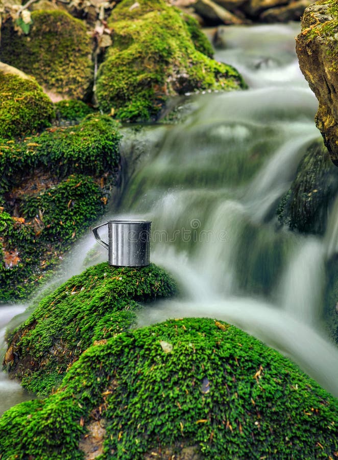 Cup of Clear Water with Drops on the Mountain River with Stone Stock ...