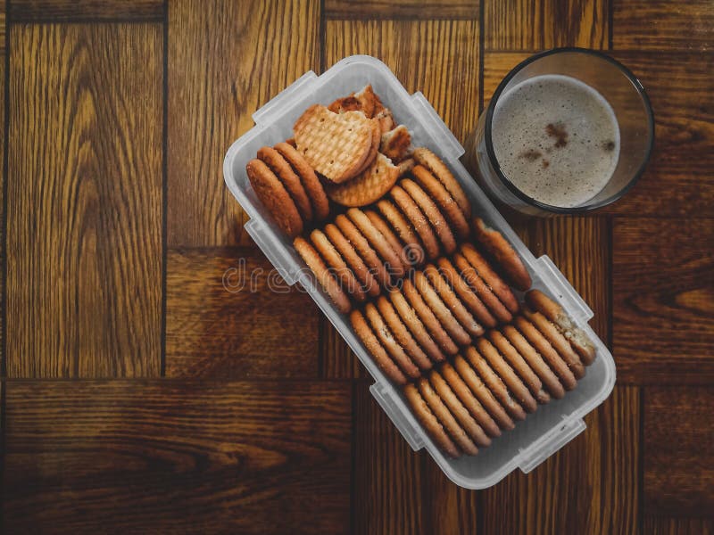 A Cup of Coffe with a Box of Biscuits Stock Image - Image of snack ...