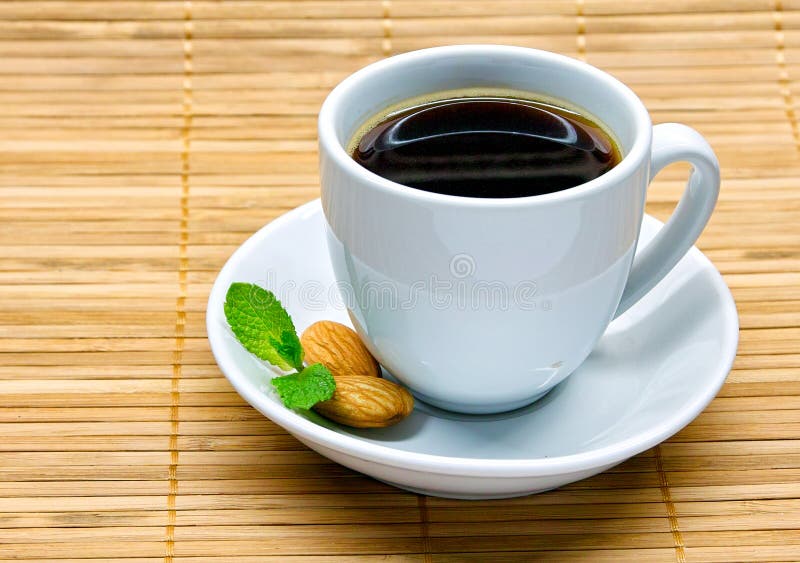Cup of Coffee with Almond and Mint Stock Photo - Image of snack, coffee ...
