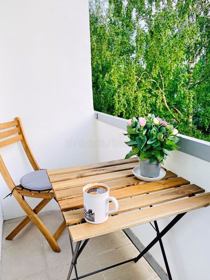Balcony with Table and Chairs Stock Image - Image of hardwood, outdoors ...