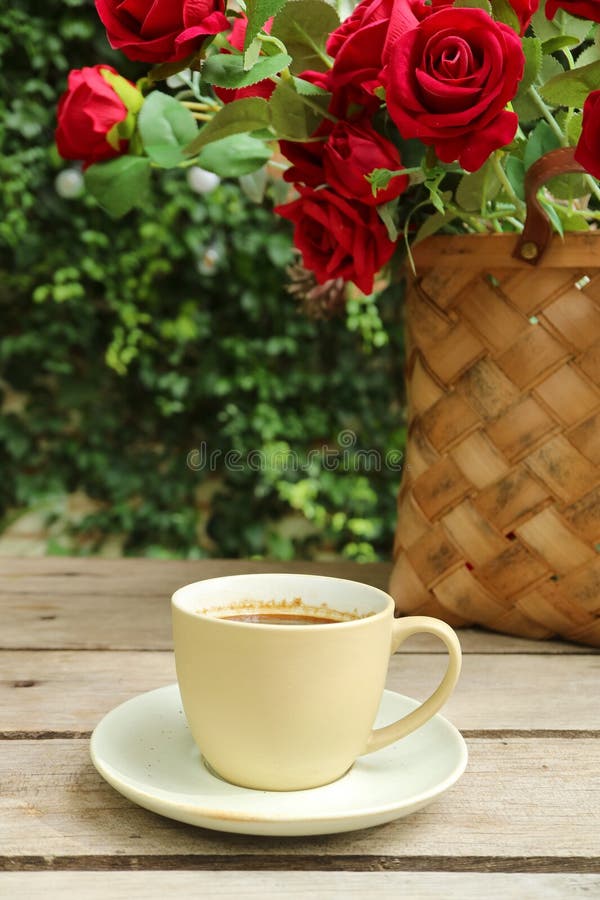 Cup of Coffee with a Basket of Roses Stock Photo - Image of foliage ...