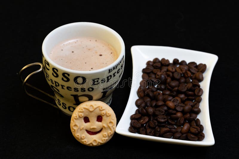 Cup of Coffee, Coffee Beans and a Smiling Cookie Stock Image - Image of ...