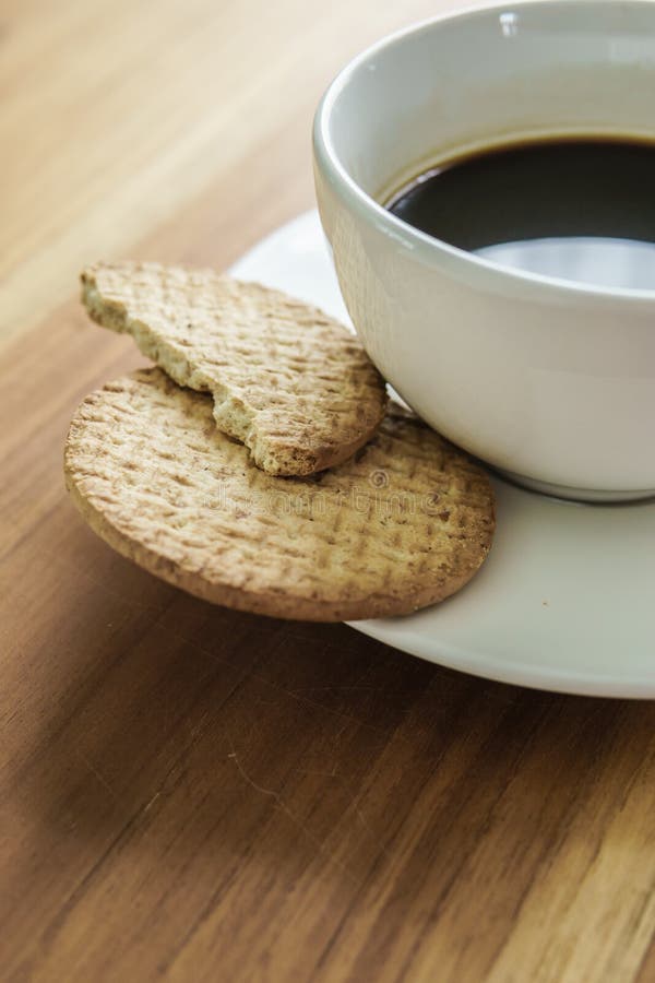 Coffee cup and biscuits stock image. Image of biscuits - 101352031
