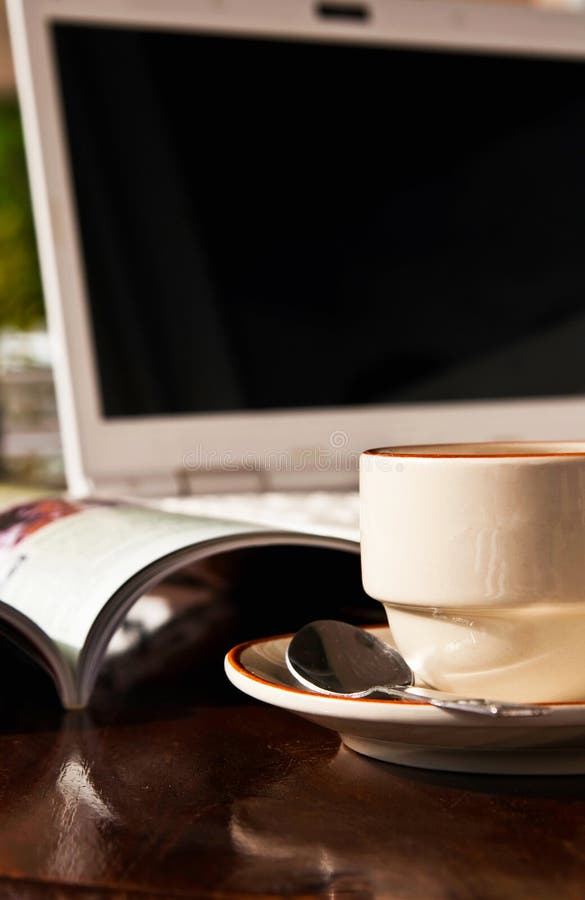 Cup of Coffee and Book beside Computer Stock Photo - Image of breakfast ...