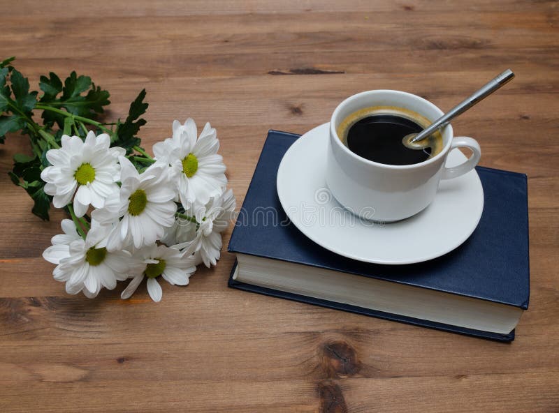 Cup of Coffee Book and White Flowers Stock Photo - Image of drink ...