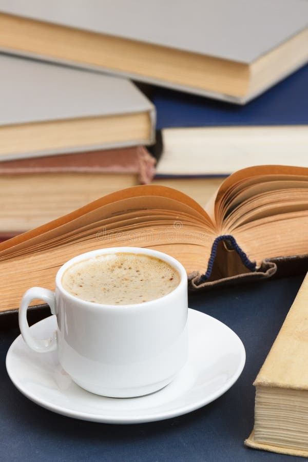 Cup of coffee with books stock image. Image of archive - 99661965