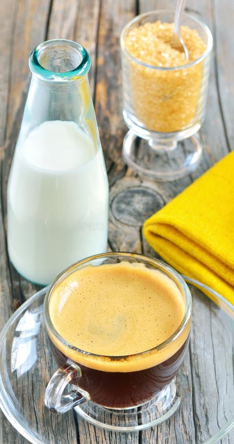 Cup of Coffee with Brown Sugar and Milk Stock Image - Image of saucer ...