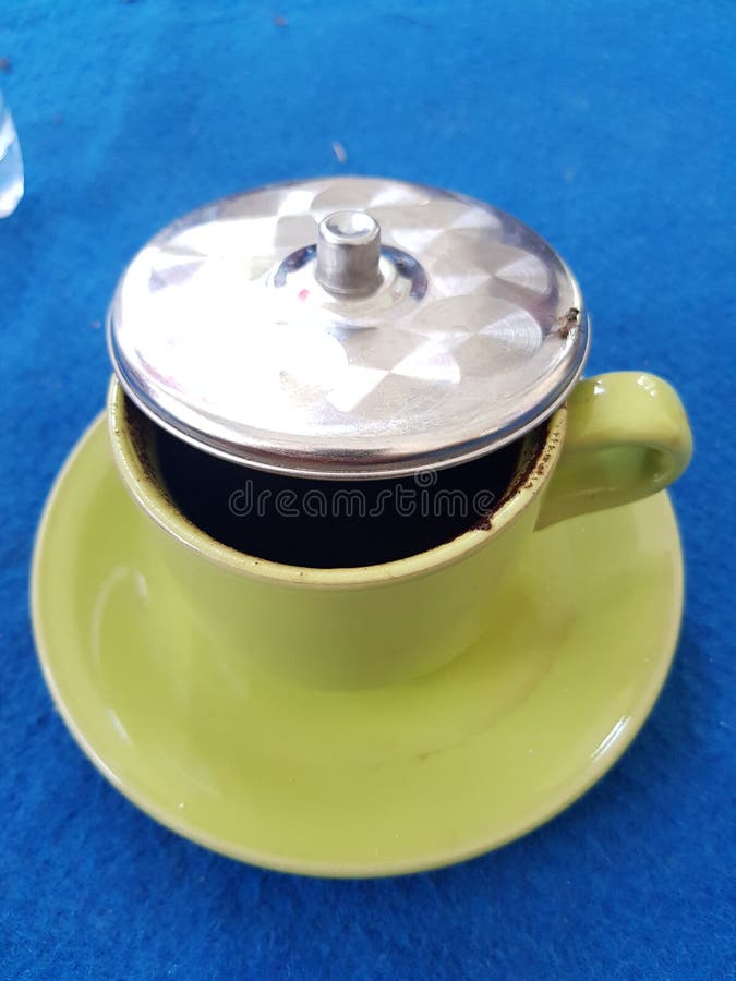 A Cup of Coffee with Cap on it Stock Photo - Image of ceramic ...