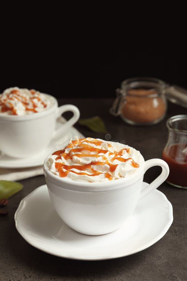 Cup of Coffee with Caramel Topping Stock Image - Image of grey ...