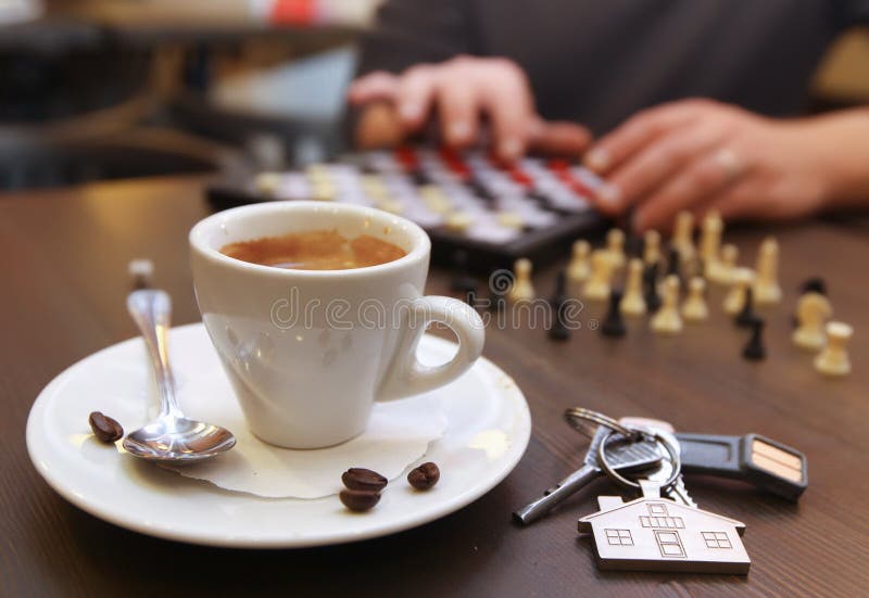 Cup of coffee and chess stock photo. Image of awaken - 43384674