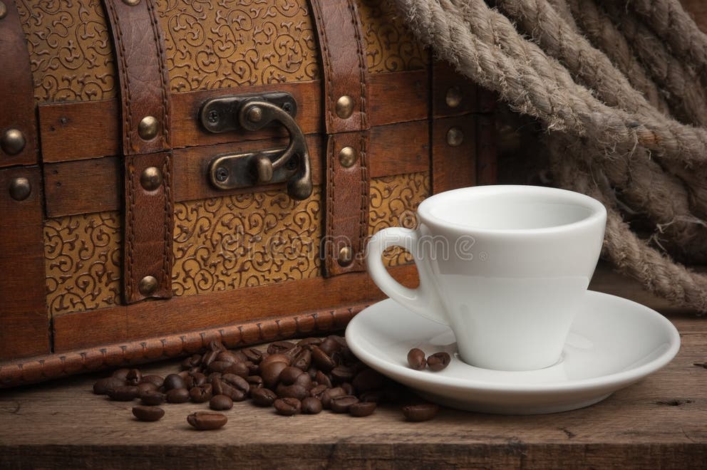 Cup of coffee and chest stock image. Image of close - 132935355
