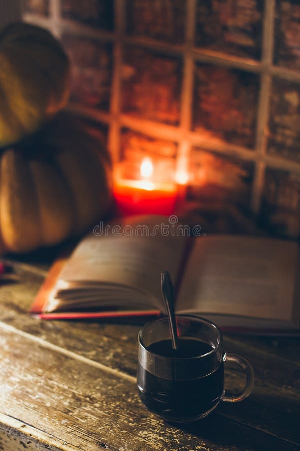 A Cup of Coffee in Cozy Rustic Autumn Atmosphere with the Candles and a ...