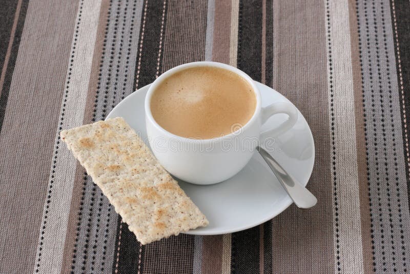 A Cup of Coffee with Cracker Stock Image - Image of breakfast, spoon ...