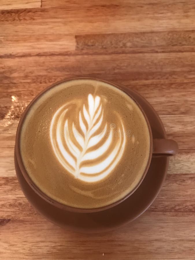 Cup of Coffee with Cream in a Bar Stock Photo - Image of restaurant ...