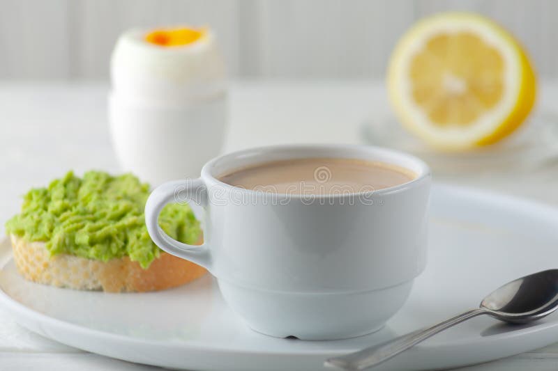 A Cup of Coffee with Cream and a Soft-boiled Egg with an Avocado ...