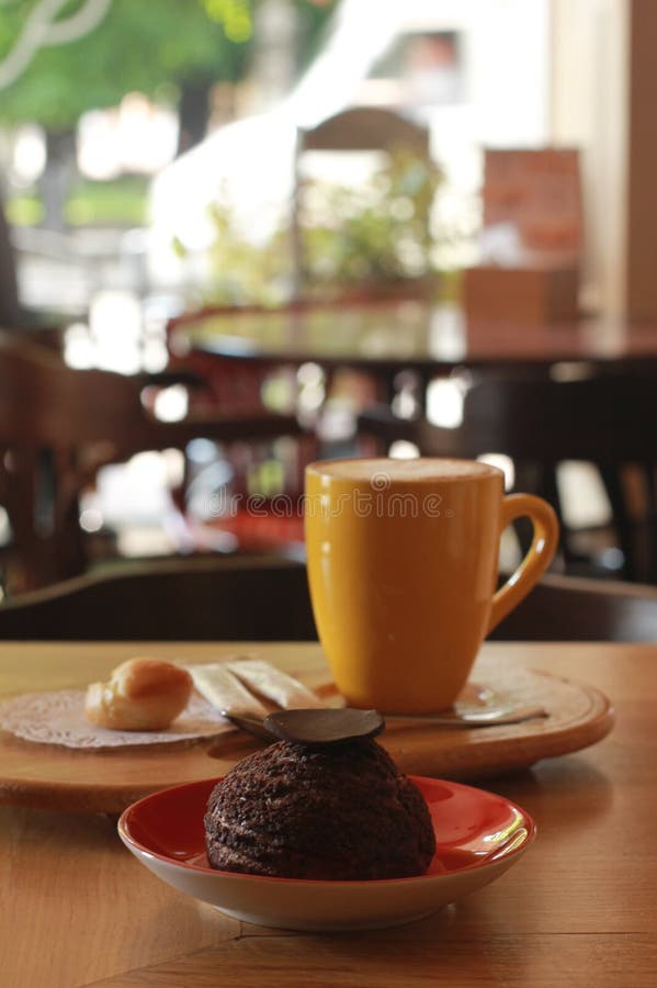 Cup of coffee with desert stock image. Image of cupcacke - 74297279