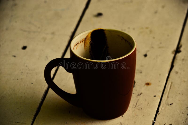 A cup of coffee is drunk stock image. Image of lighting - 335771659