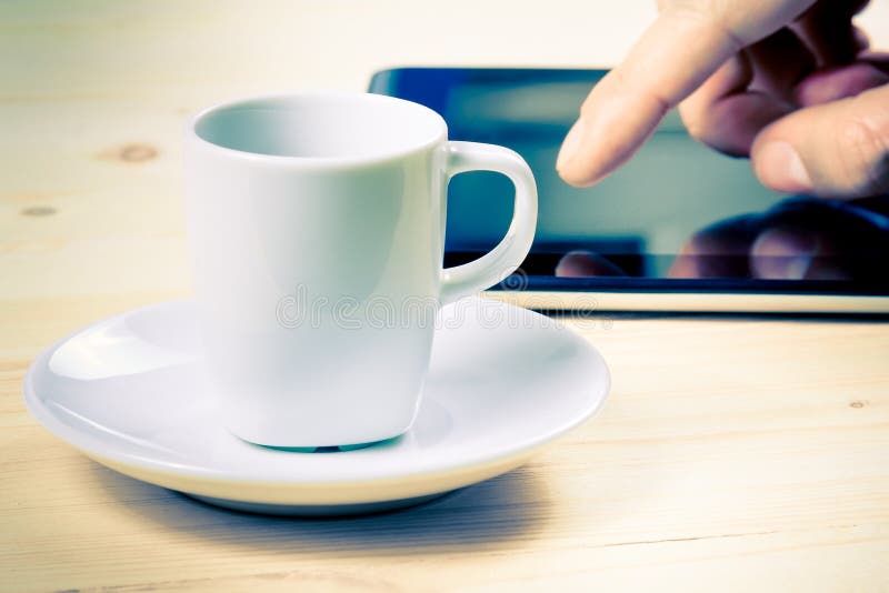 Cup of Coffee in Front of the Tablet, Concept of New Technology Stock ...